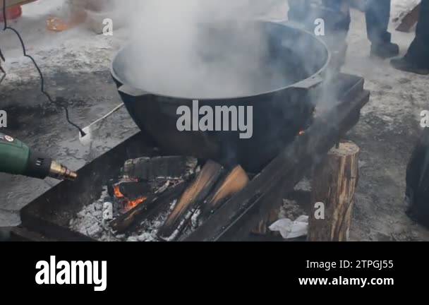 frying pan fire street pilaf, on the street prepare food for feeding ...
