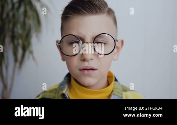 Close-up of the face of a little boy who has strabismus eyes and poor ...