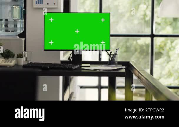 Empty desk with greenscreen layout presenting blank copyspace template ...