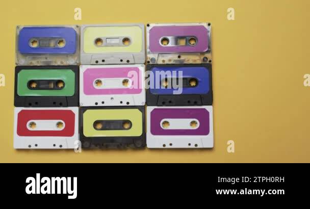 Video of retro tapes with copy space on yellow background. Retro ...