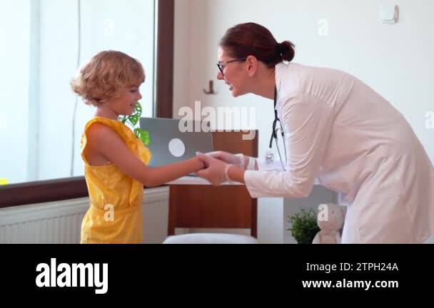 Child vaccination in pediatrician hospital medical clinic office ...