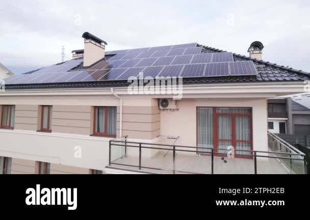 Video footage of residential house with solar panel modules for ...