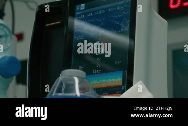 Close up on modern patient monitor show rhythm, SPO2, blood pressure ...
