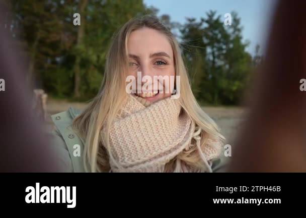 Selfie view young joyful Caucasian woman zoomer laugh out loud and spin ...