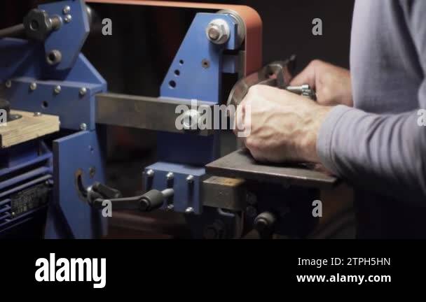 Creating knife blade from the workpiece, turning the workpiece on the ...