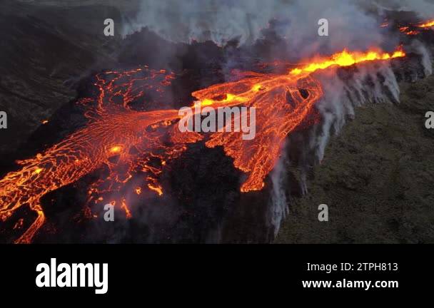 Close up look on Volcanic eruption. Active volcanic crater. Aerial ...