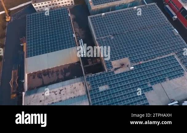 Innovative solar station on roofs. Photovoltaic cells on a huge solar ...