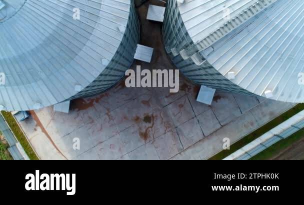 Modern agricultural containers. Metal grain elevators. Large storage ...