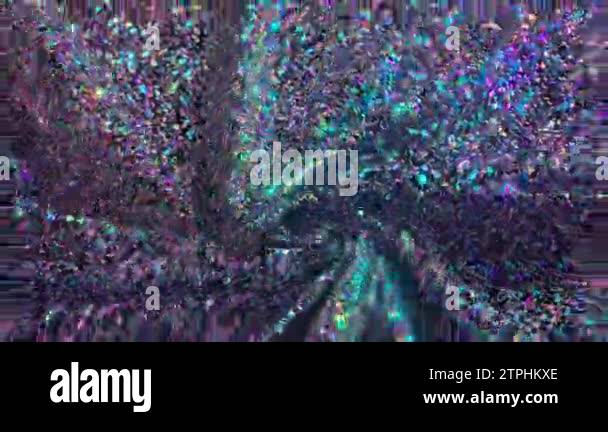 A shimmering 3D swirl of sequin fabric radiates a spectrum of colors ...