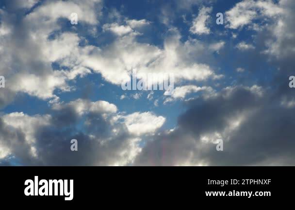 Beautiful winter clouds in the sky. Volumetric light effect. The ...