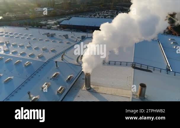 smoke from a pipe on the roof of a factory or factory, the roof of a ...