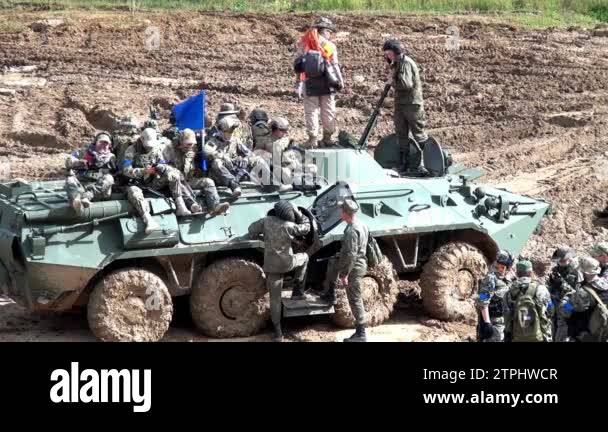 Squad of strikeball team with machine submachine guns on panze Stock ...