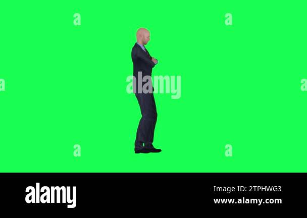 Bald man in formal suit waiting angrily left angle isolated green ...