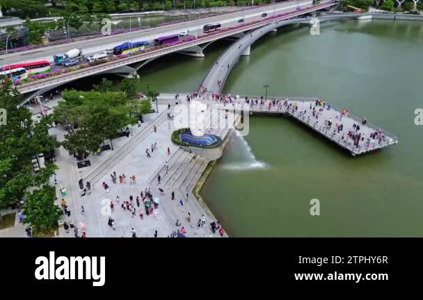 Aerial 4k drone reveal shot of Merlion, the iconic lion mermaid statue ...