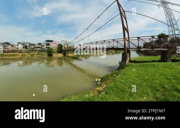 The city of Jakarta and the river Ciliwung polluted with garbage and ...