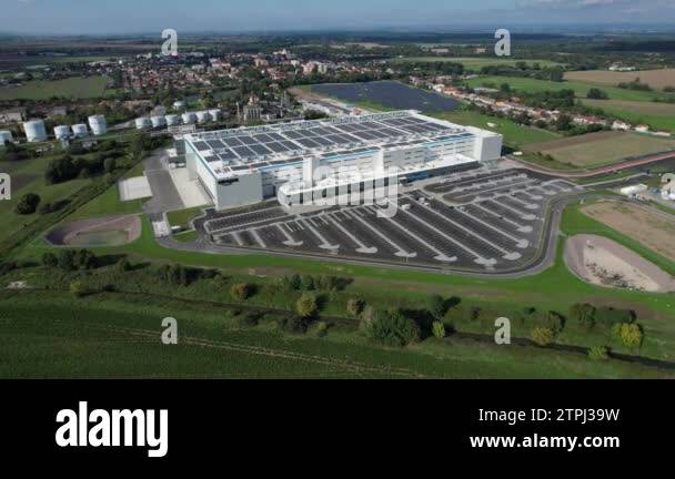 modern distribution logistic center aerial drone view of industrial ...