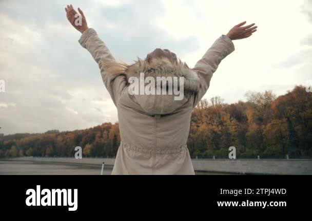 Woman Floating On Boat Down River Of Pleasure Raised Her Arms Up And To ...