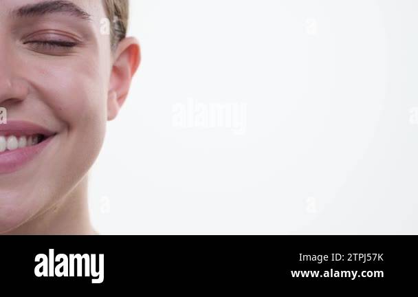 Woman captivates the viewer as she gazes directly into the camera ...