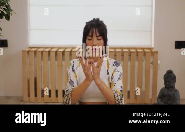 Woman doing meditation yoga mudra at home and relax. Hands of woman ...