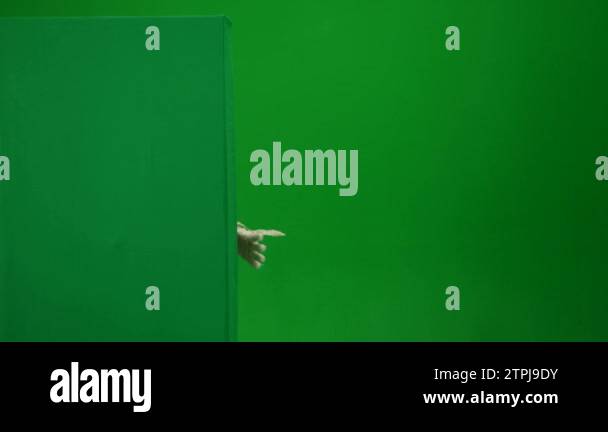 Green screen isolated chroma key video capturing a mummy peeking from ...