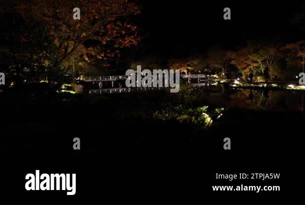 An illuminated Japanese garden at Tachikawa park during the winter ...
