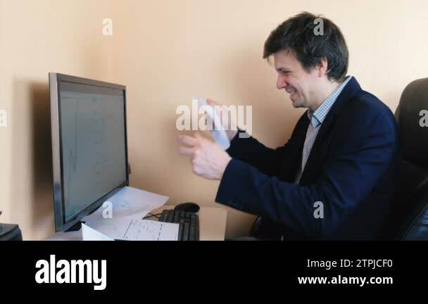 Confused man working computer desperate Stock Videos & Footage - HD and ...
