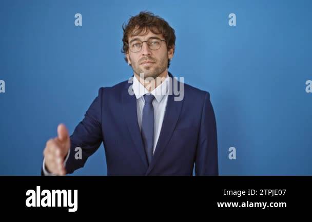 Sightless young hispanic man with a standoffish expression, hiding his ...