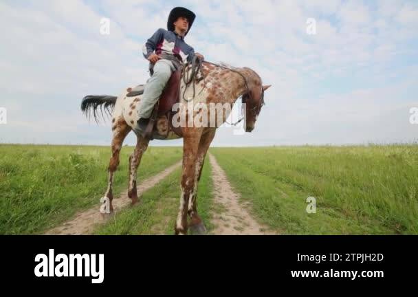 Low angle of cowboy Stock Videos & Footage - HD and 4K Video Clips - Alamy