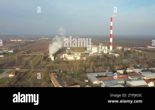 Above view, dolly move orbit, thermal power plant with smokestack and ...