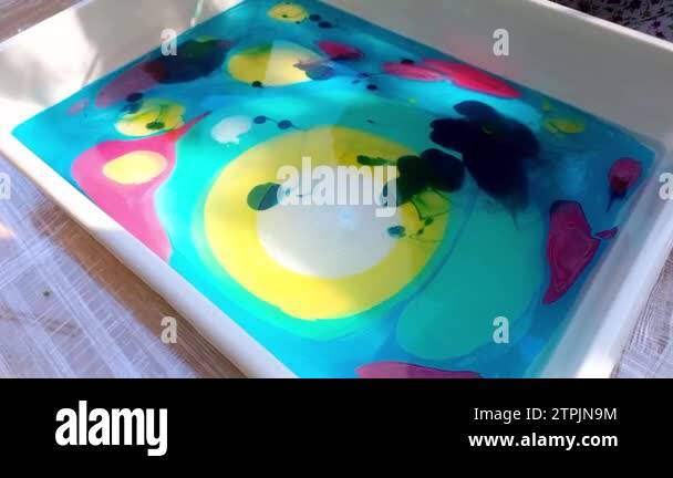 Lesson on drawing technique Ebru. child drawing, mixing paints ...