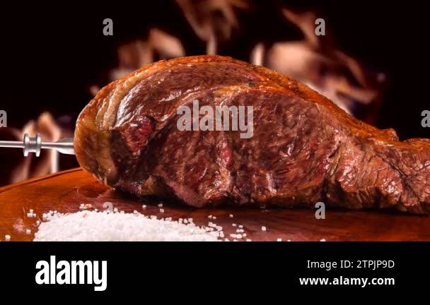 Meat Alcatra and chimarrao, traditional Brazilian barbecue with fire ...