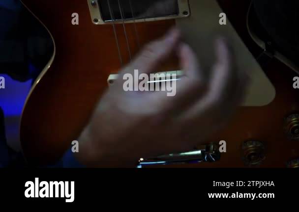 Man hands playing electric guitar. Human hands and fingers on guitar ...