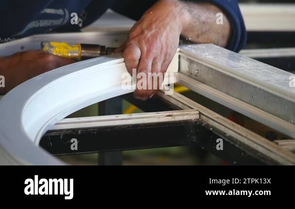 Automatic line machine for sticking together PVC sections of windows ...