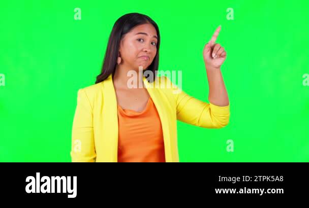 Green screen, woman and thinking face with hand pointing in studio for how to, steps or menu on ...