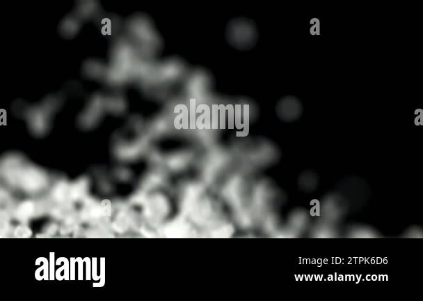 Salt crystals fly up and fall down. Macro shot. Filmed on a high-speed ...