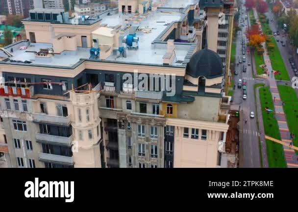 Construction of a tall building in the city. Modern block of flats ...