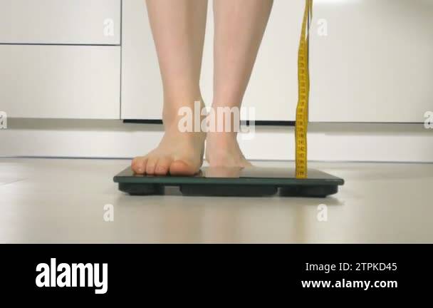 Scales feet woman Stock Videos & Footage - HD and 4K Video Clips - Alamy