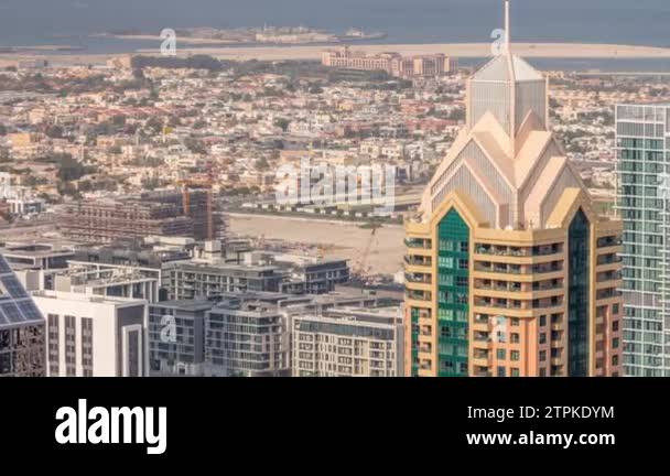 City walk houses and villas. High-rise buildings on Sheikh Zayed Road ...