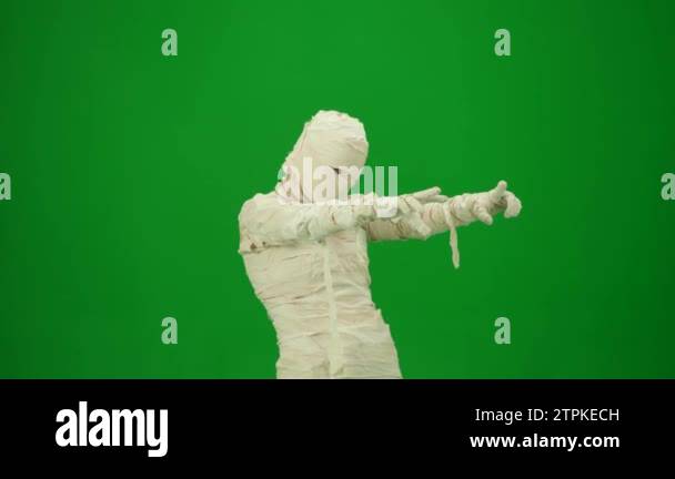 Green screen isolated chroma key half turn video capturing a mummy ...
