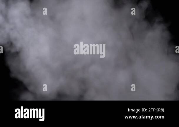 Explosion of a White Ice Cloud of Smoke in Blurred Motion on a Black ...