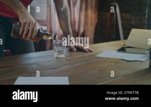 Whiskey bottle pouring in glass. Pouring alcohol drinks. Jack daniels ...