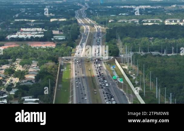 Slow traffic at industrial roadworks in Sarasota, Florida. Wide ...