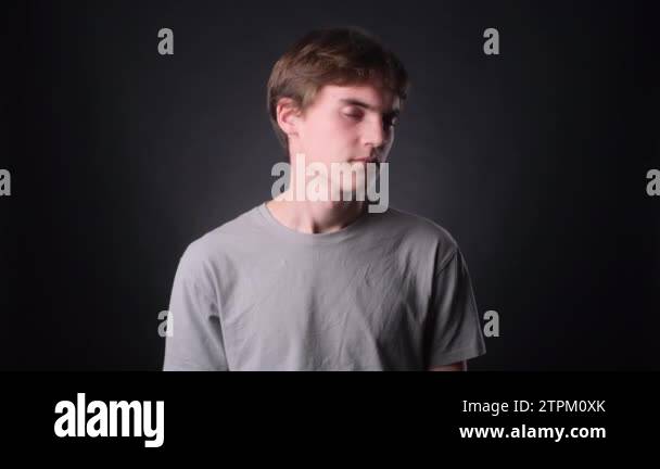 Serious Caucasian man, dressed casually, confidently says No with ...