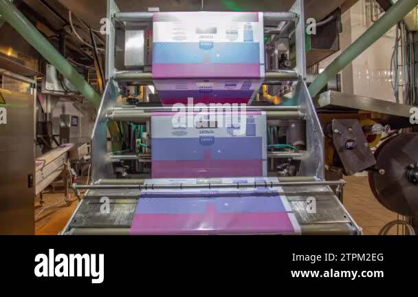 Printing press rotates rollers and produces posters. Printing machine ...