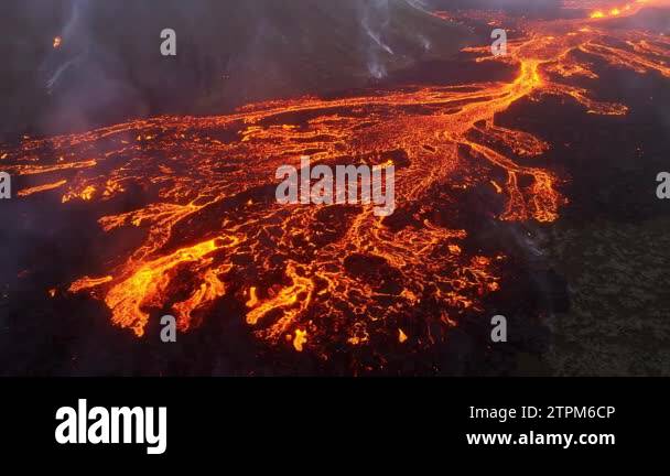 Close up look on Volcanic eruption. Active volcanic crater. Aerial ...