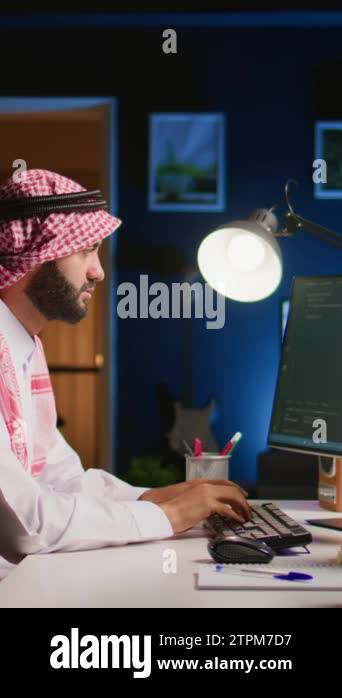 Vertical Video Licensed Arabic Engineer Updating Neural Networks Writing Intricate Binary Code