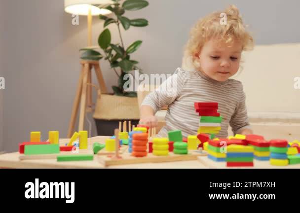 Creative block play. Nursery development activities. Shape sorting at ...