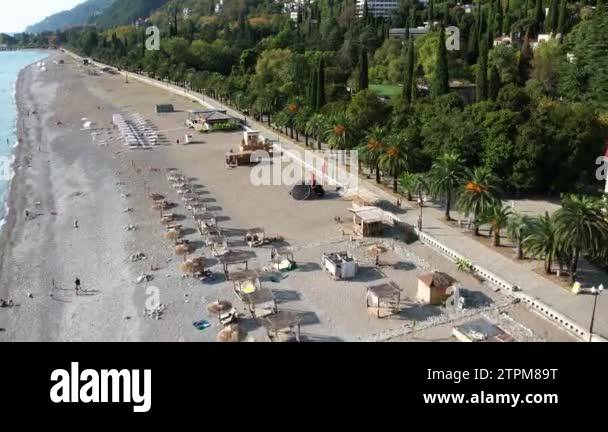 Drone shooting of the beach, the black sea, the city of Gagra, white ...