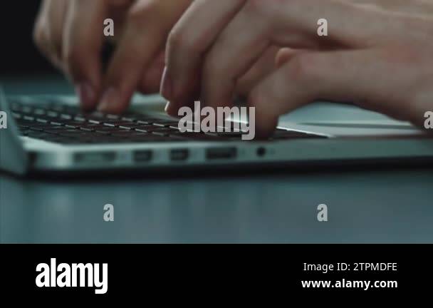 Hands typing on a laptop keyboard. Laptop keyboard typing. Hands touch ... Hands typing on a laptop keyboard. Laptop keyboard typing. Hands touch ...
