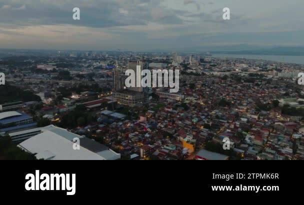 Top view of Davao City with modern resident buildings at dusk. Mindanao ...